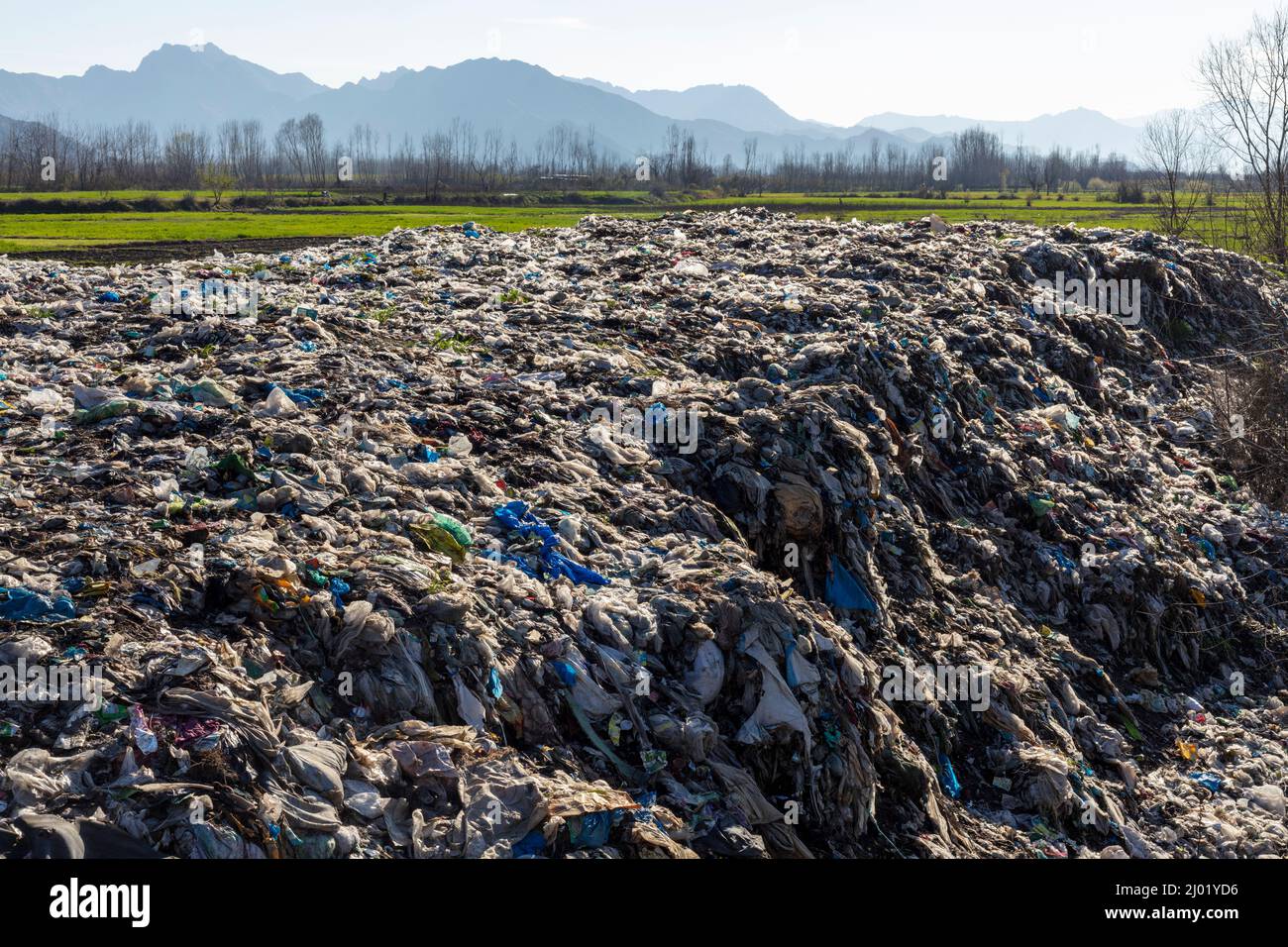 Garbage landfill site in the fields Stock Photo - Alamy