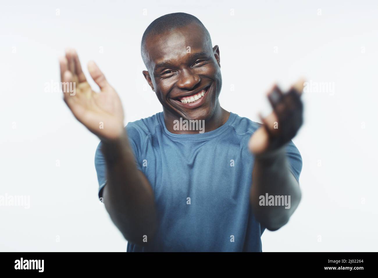 You deserve a round of applause, well done. Studio shot of a handsome ...