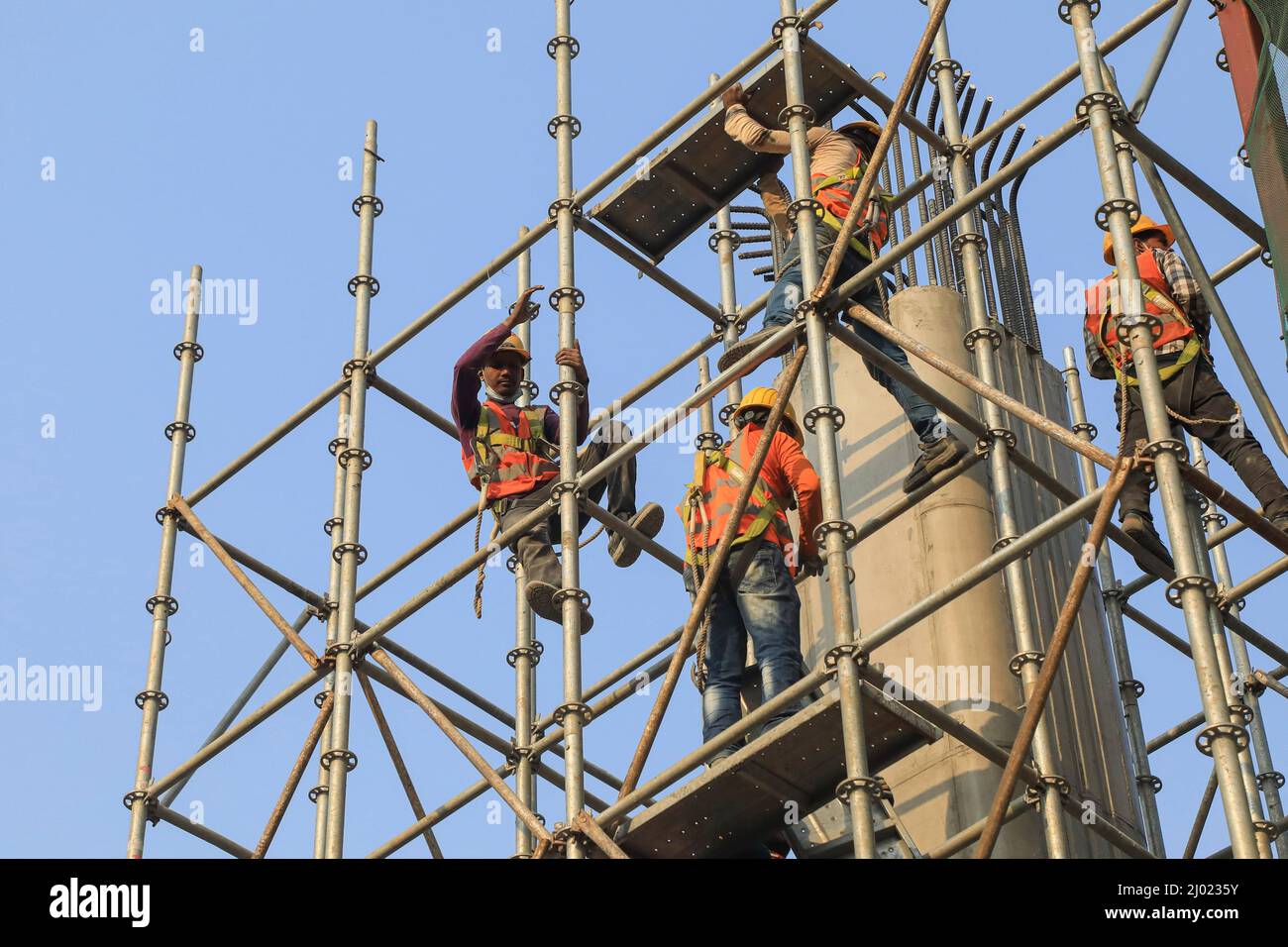 Bangladeshi workers seen working at the Developing project. (Photo by ...