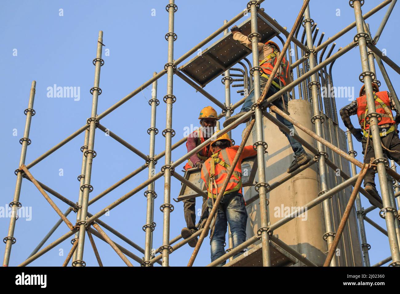 Bangladeshi workers seen working at the Developing project. (Photo by ...