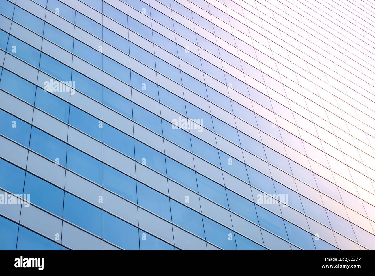 Blue glass of modern building for save energy Stock Photo - Alamy