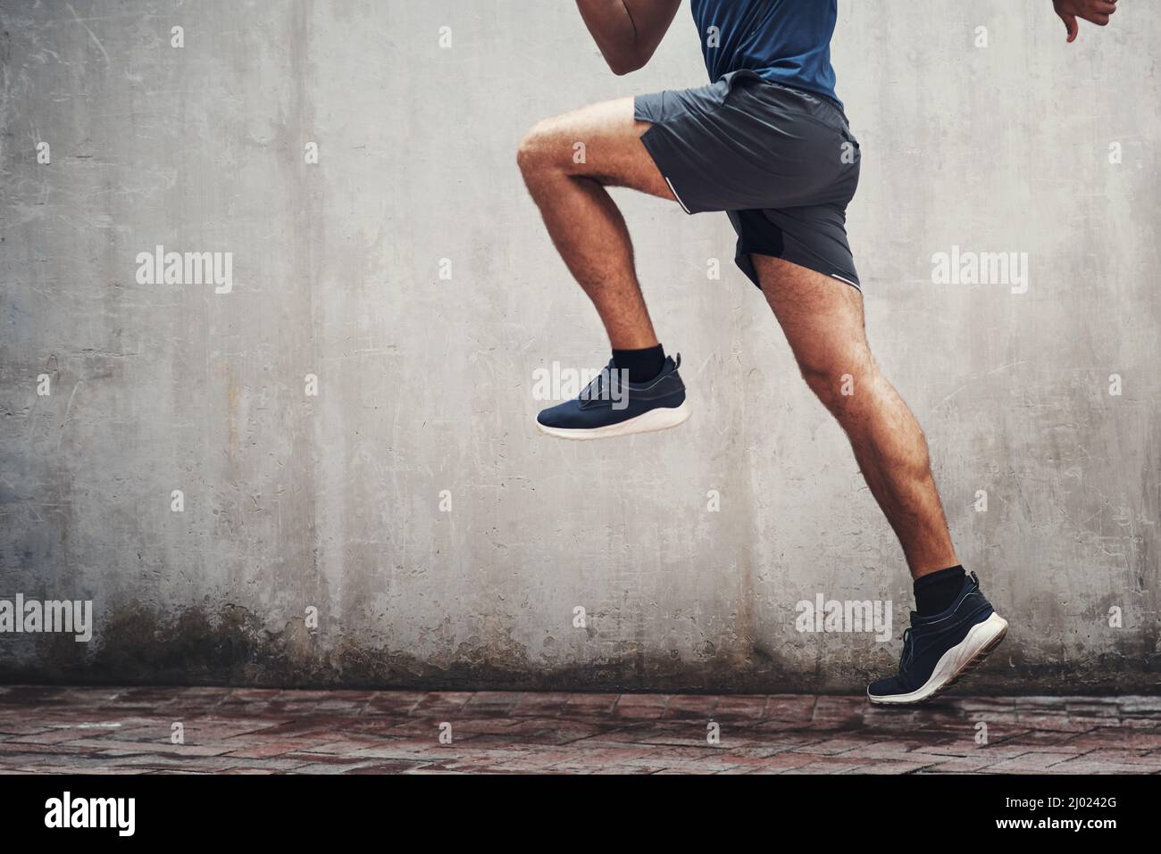 Set off to the finishing line. Closeup shot of an unrecognizable man ...