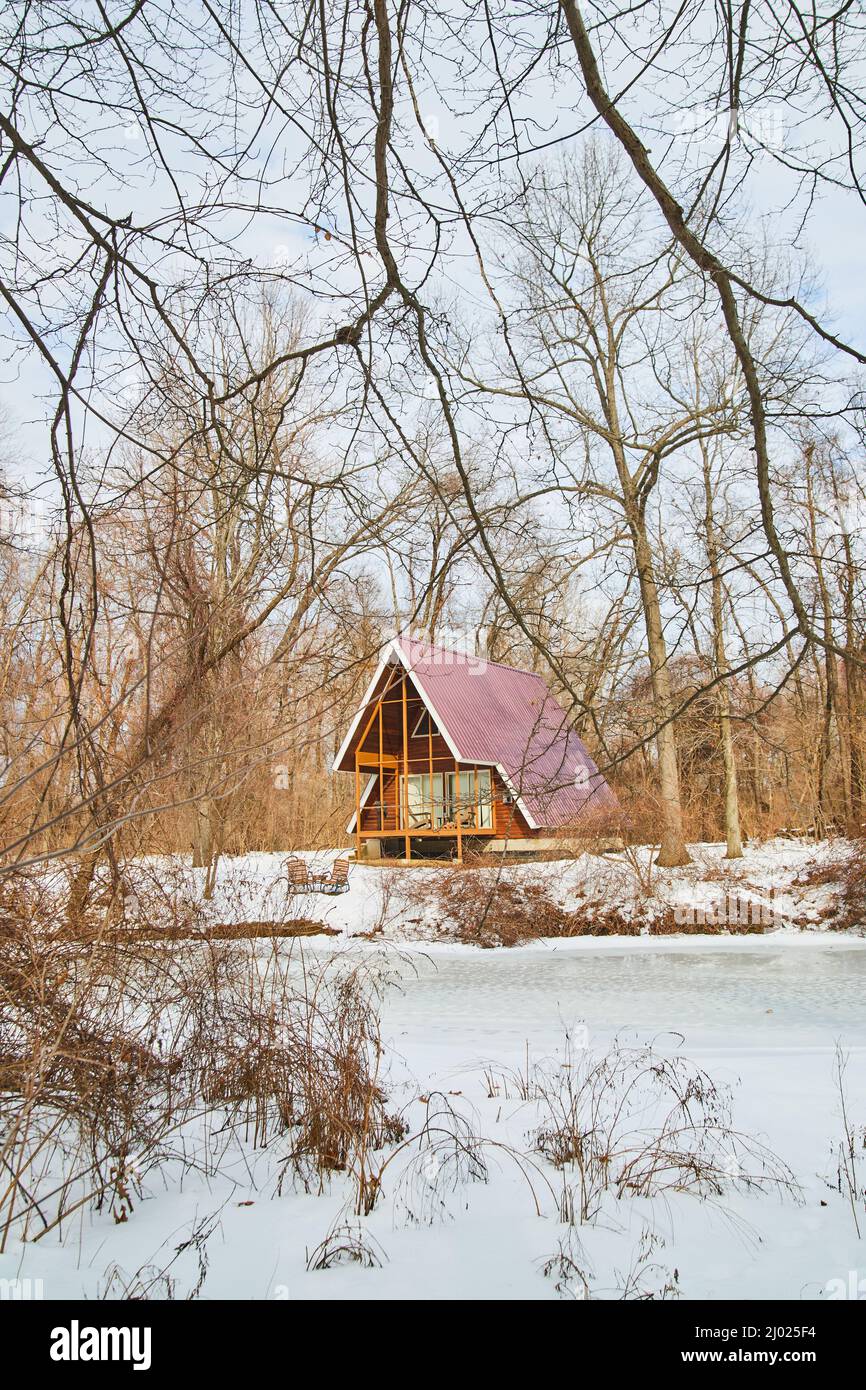 Perfect cabin getaway on frozen lake in winter Stock Photo - Alamy