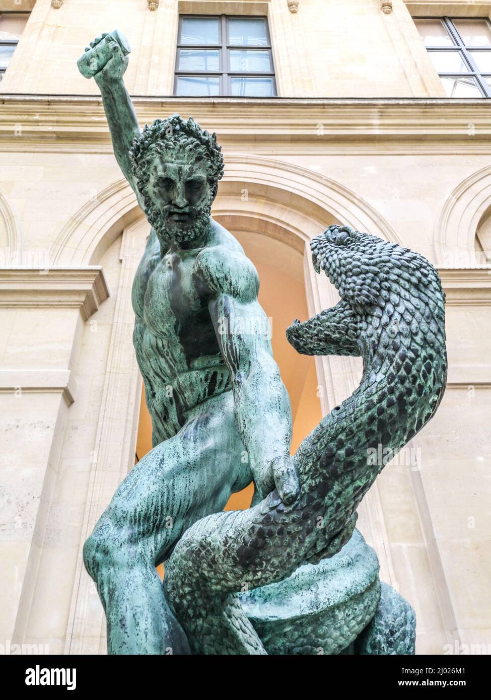 Vertical shot of a beautiful statue in a museum in Paris, France Stock ...
