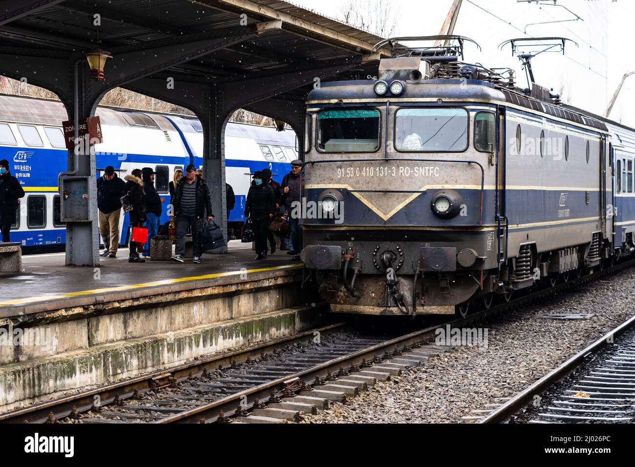 Train waiting for commuters at train platform at Bucharest North ...