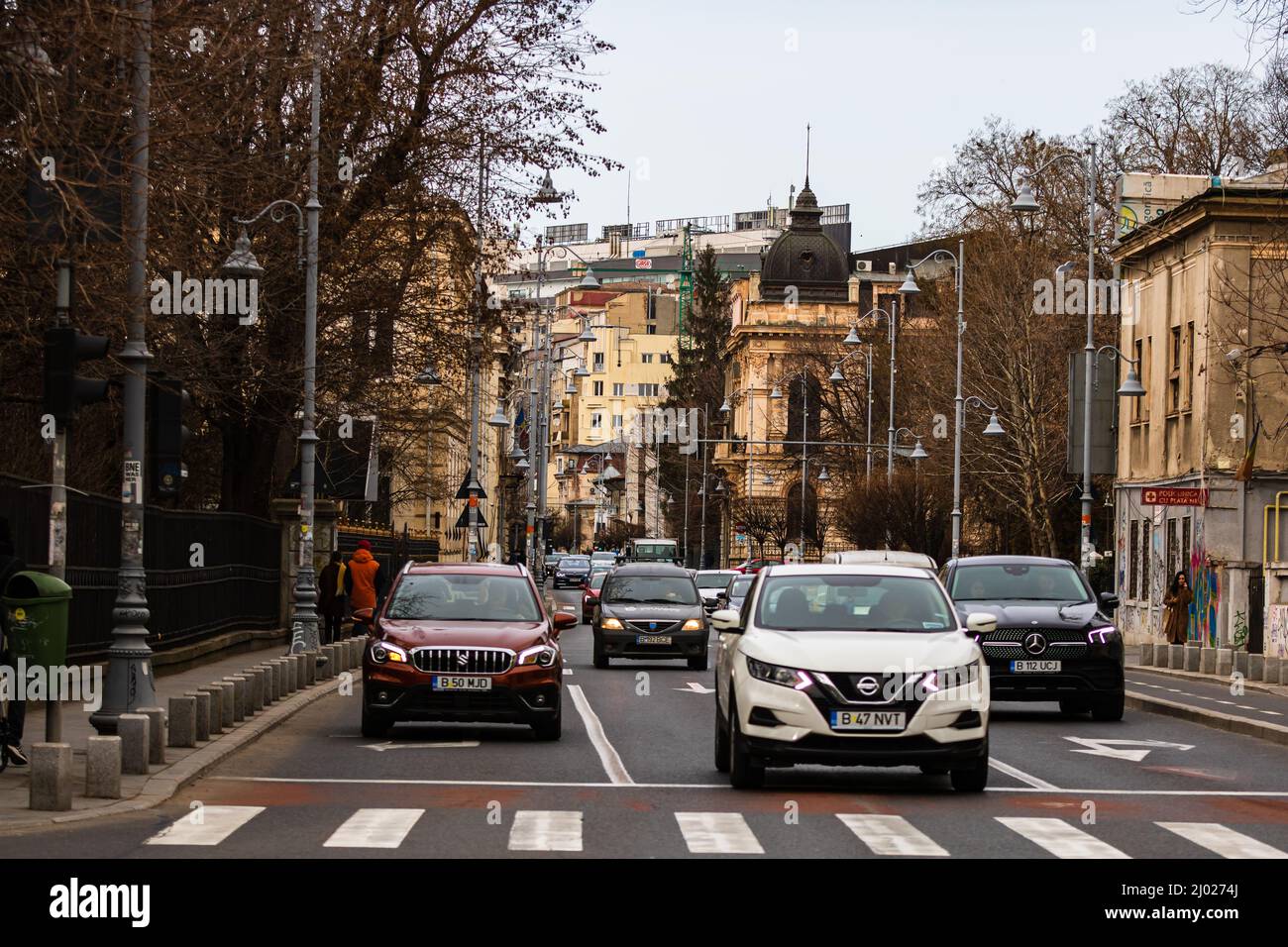 Car traffic at rush hour in downtown area of the city. Car pollution ...