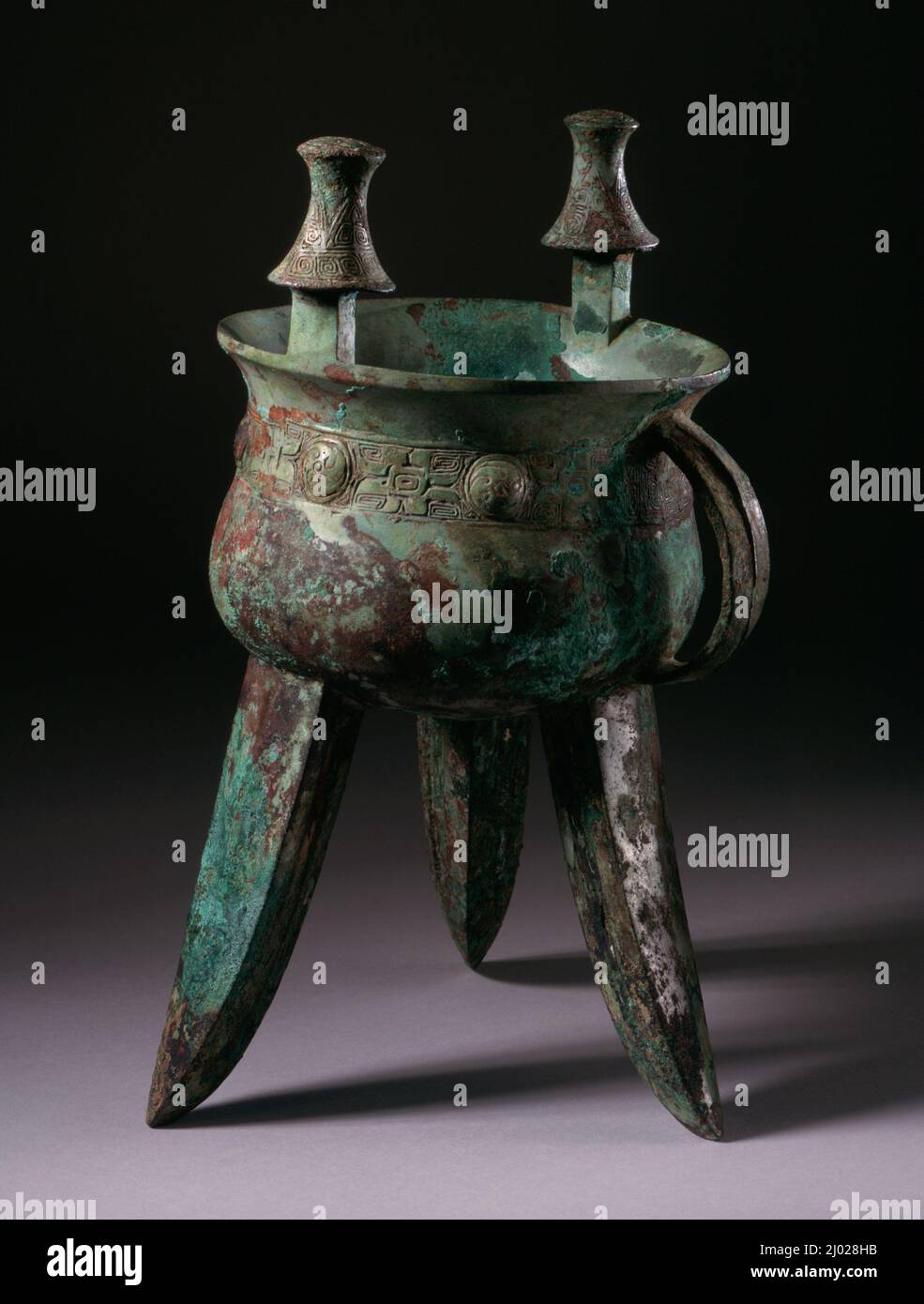 Large Ritual Wine Warmer (Jia) with Whorls and Spirals. China, probably ...