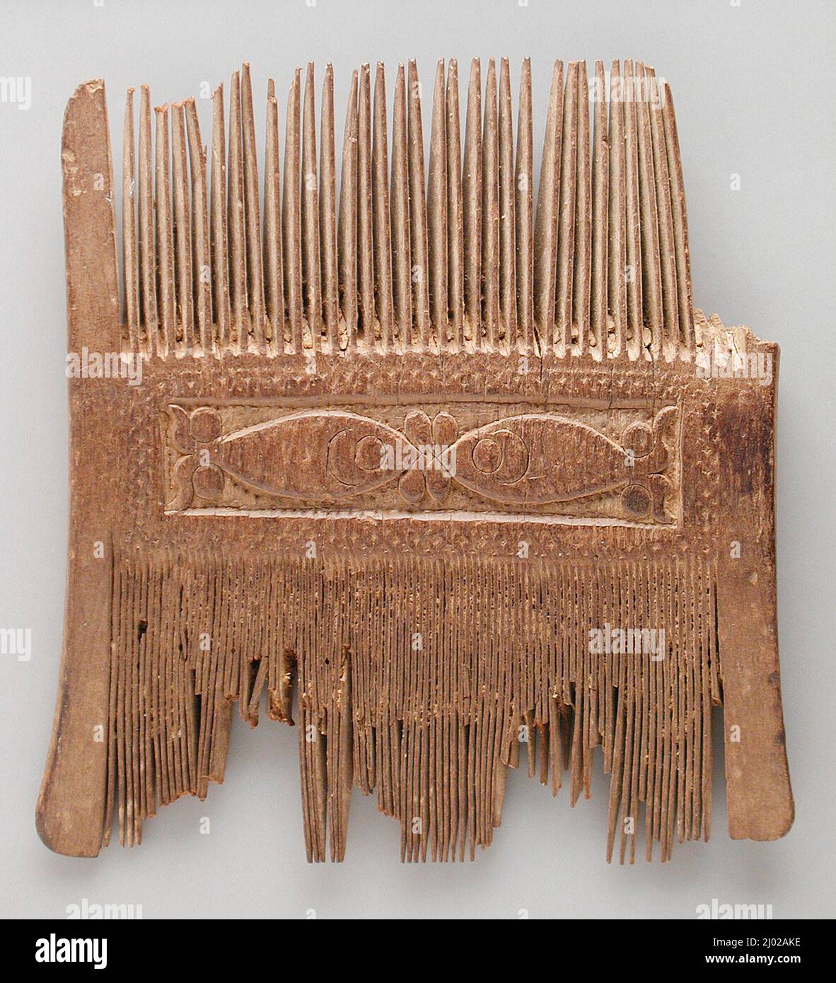 Wooden Comb Depicting Two Fish. Egypt, 10th-12th century. Tools and ... Wooden Comb Depicting Two Fish. Egypt, 10th-12th century. Tools and ...