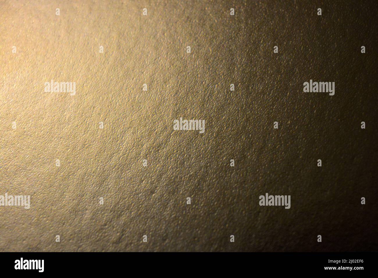 Golden matte paper with a rough surface, gilding with a dark and golden ...