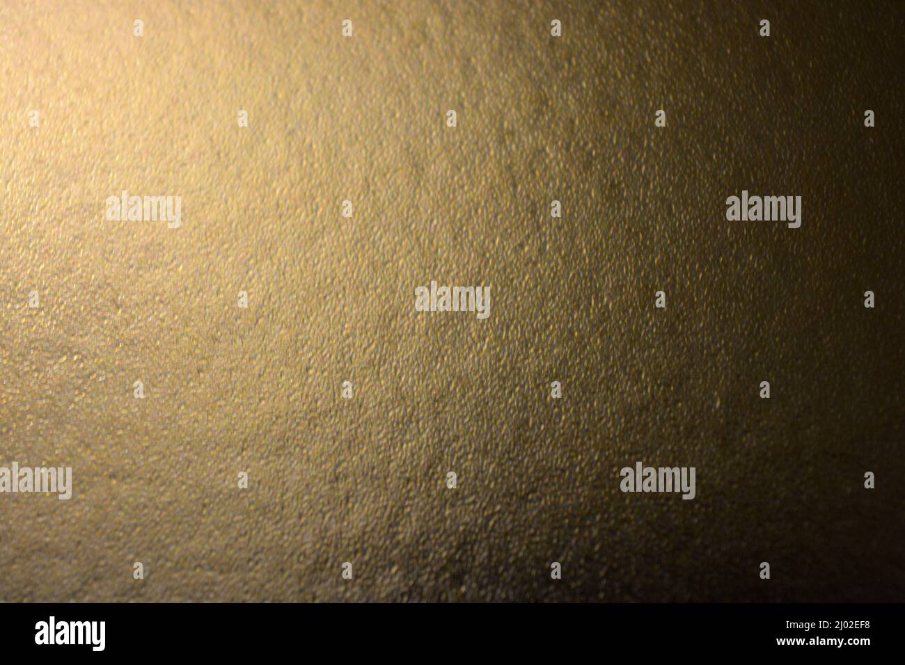 Golden matte paper with a rough surface, gilding with a dark and golden ...