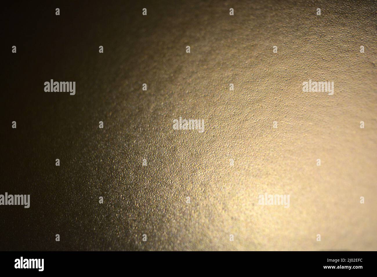 Golden matte paper with a rough surface, gilding with a dark and golden ...