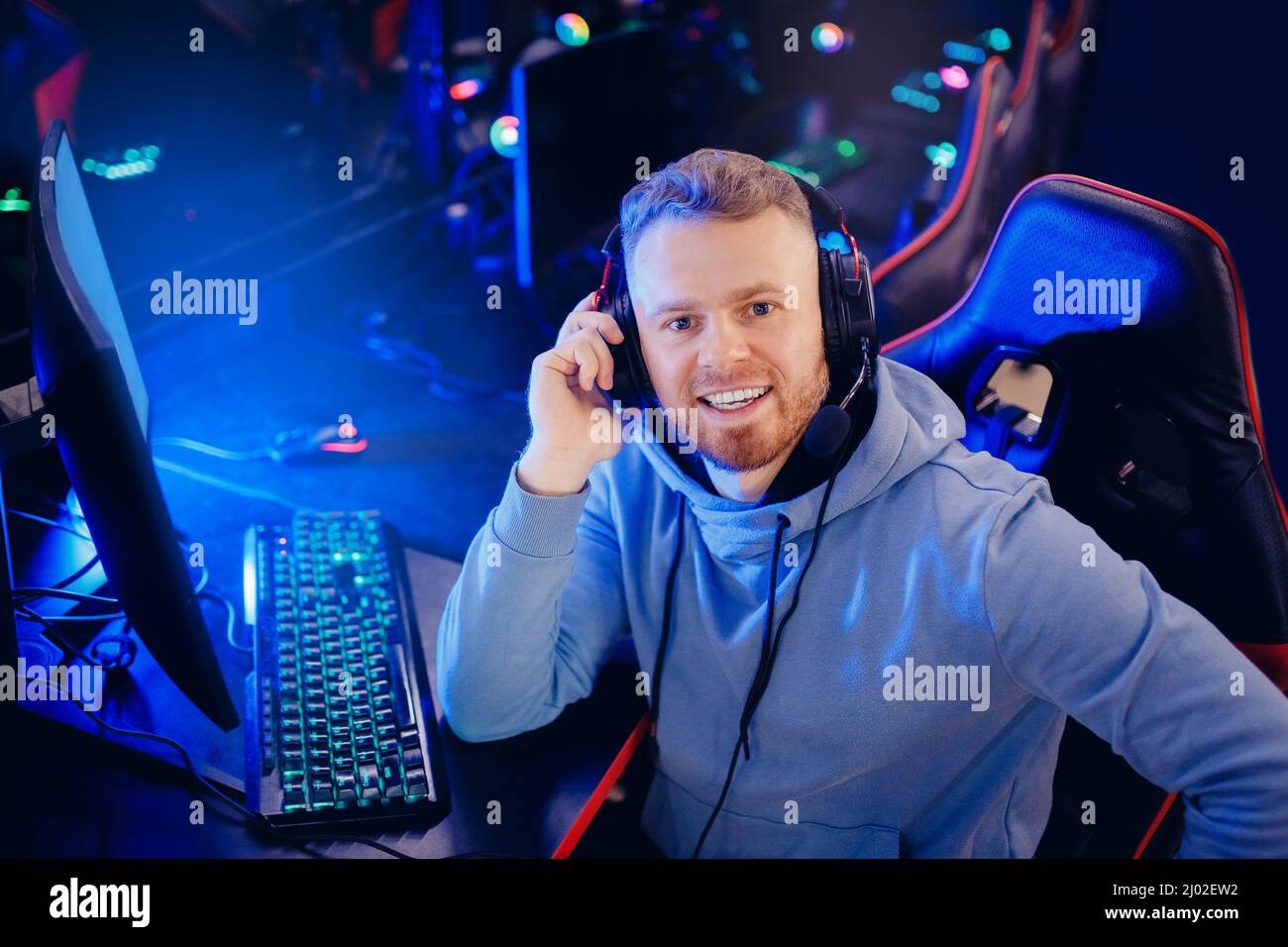 Streamer young man professional gamer playing online games computer ...