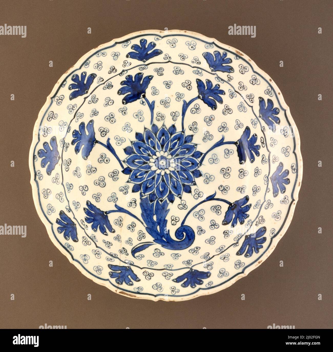 Plate. Turkey, Iznik, circa 1550-60/956-968 A.H.. Ceramics. Fritware ...