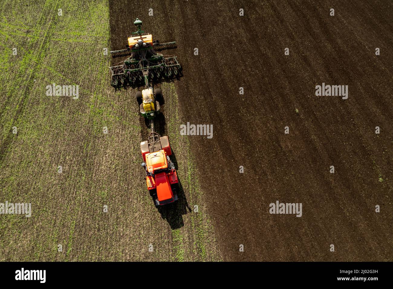 Arable agriculture concept, Aerial top view rural. Farmer on tractor ...