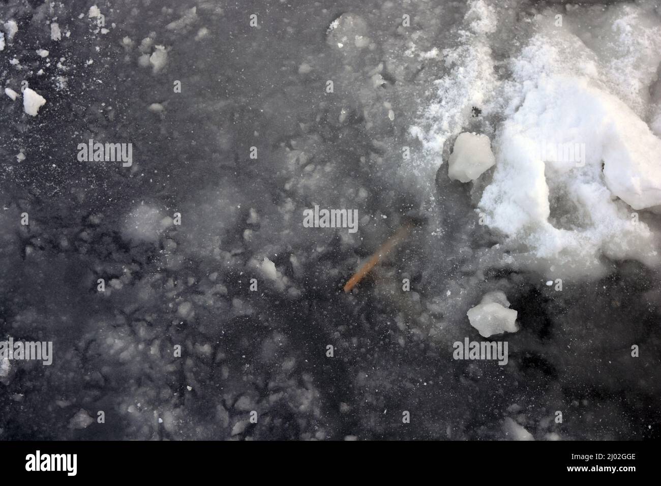 Beautiful and unusual backgrounds of nature, a thick layer of ice with ...