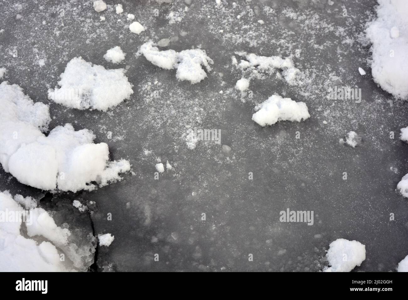 Beautiful and unusual backgrounds of nature, a thick layer of ice with ...