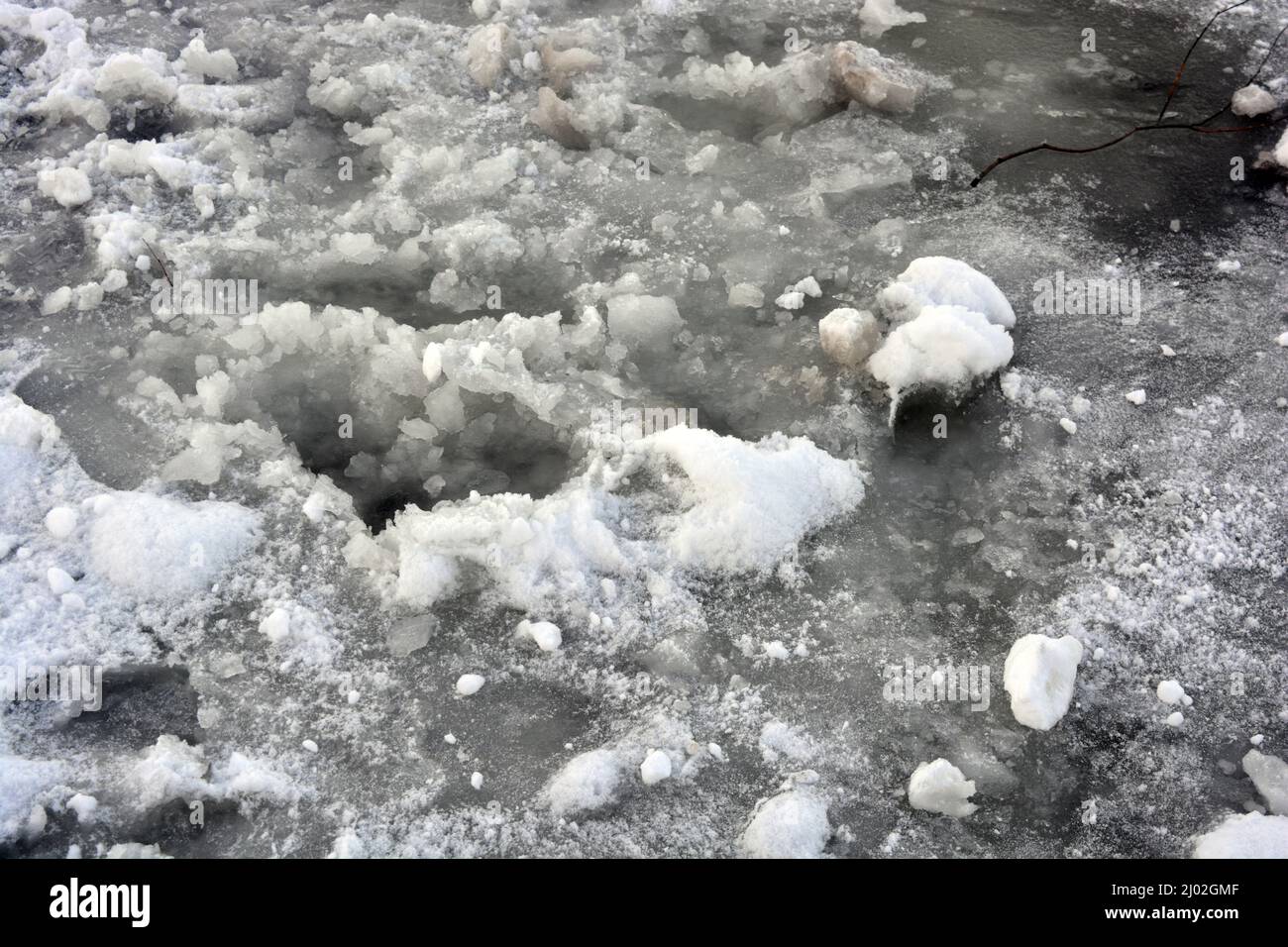 Beautiful and unusual backgrounds of nature, a thick layer of ice with ...