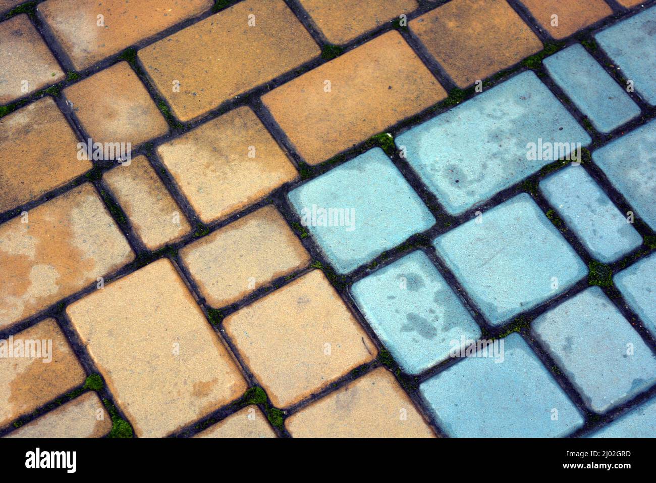 Building materials, road surface, pavement made of colored stones blue ...