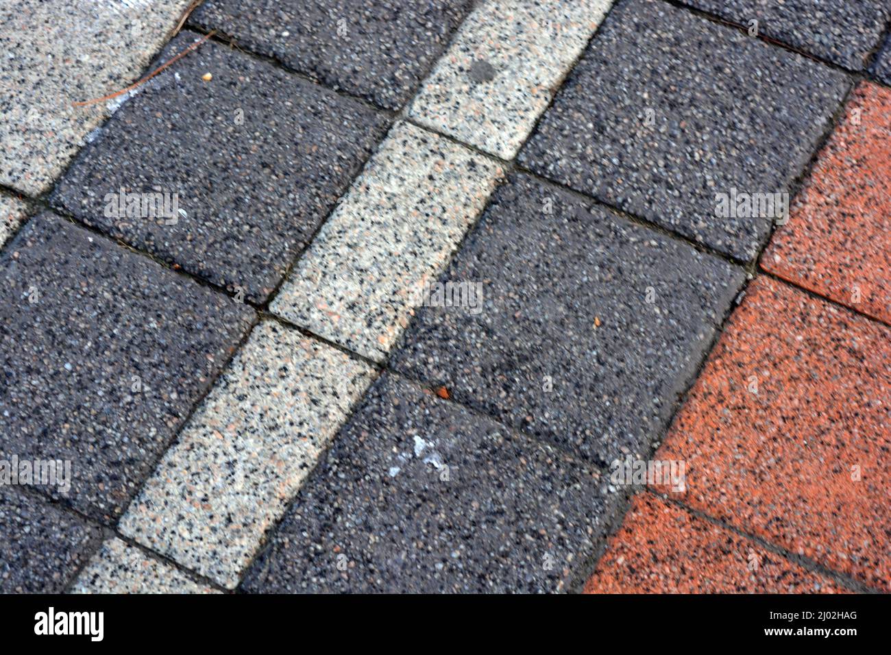 Building materials, road surface, pavement made of colored stones blue ...