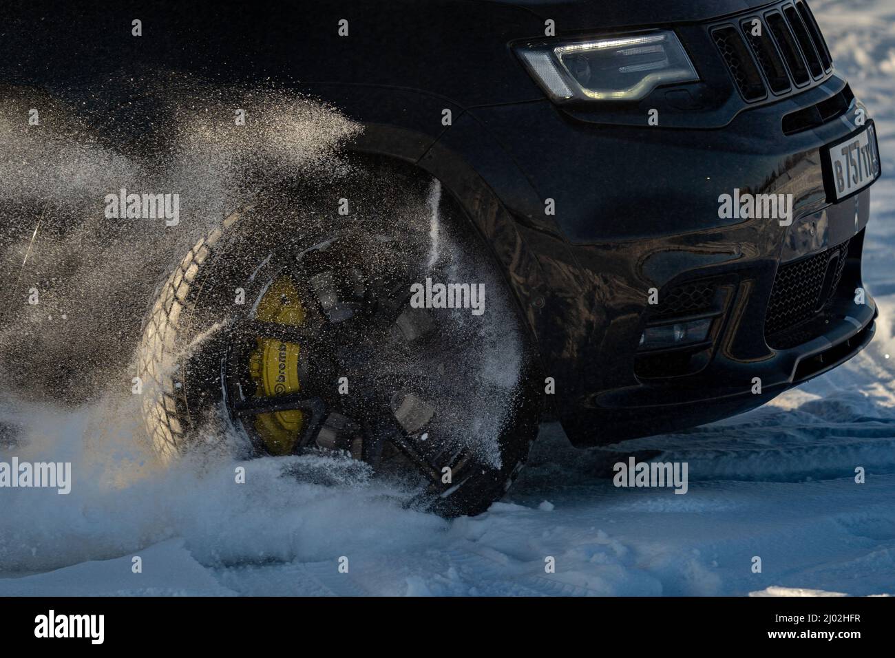 extreme driving, the car is moving rapidly over the smooth snow and ...