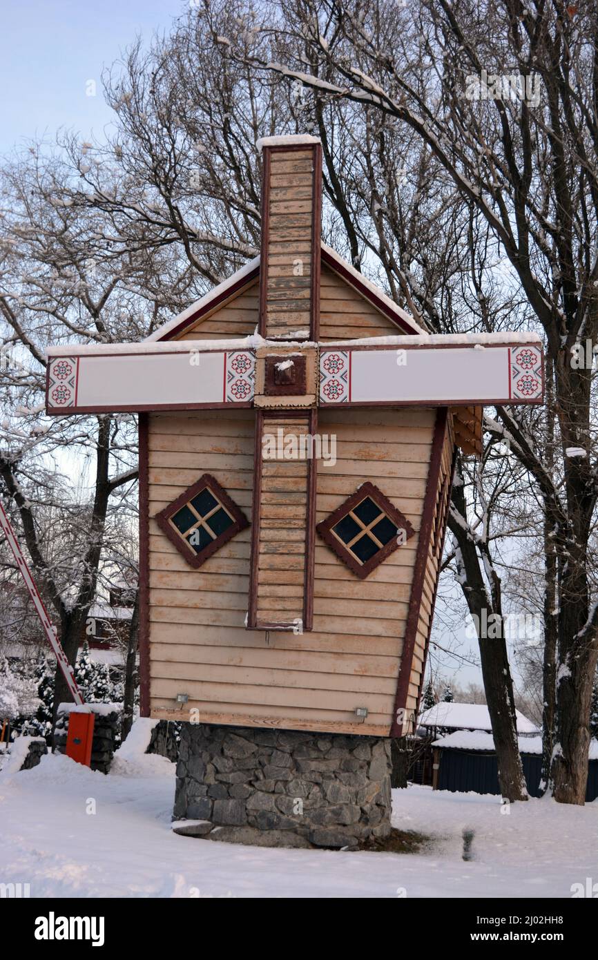 A beautiful little house, a small wooden model of a mill which is ...