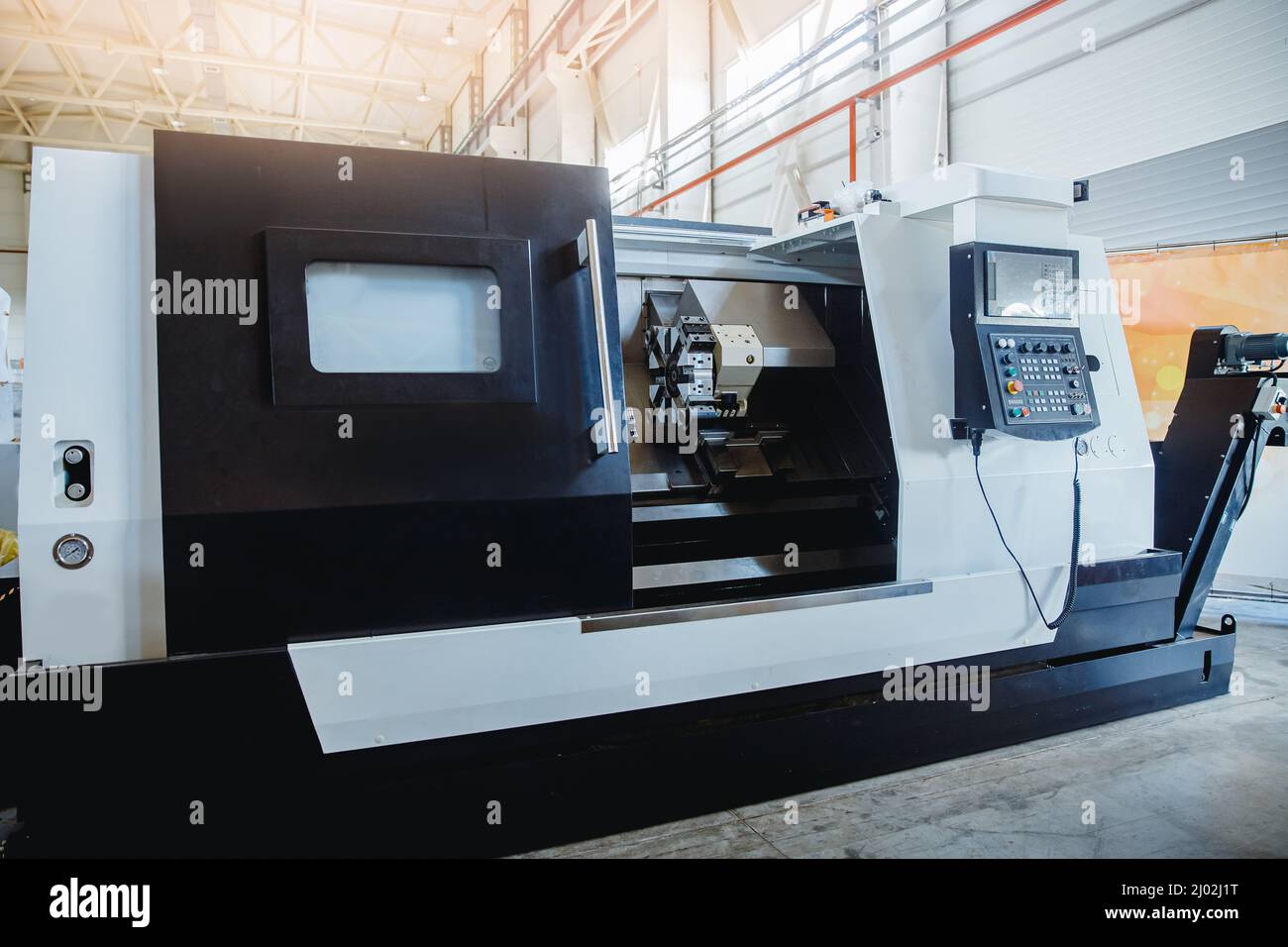 Modern CNC industrial production for metal processing, drilling and ...