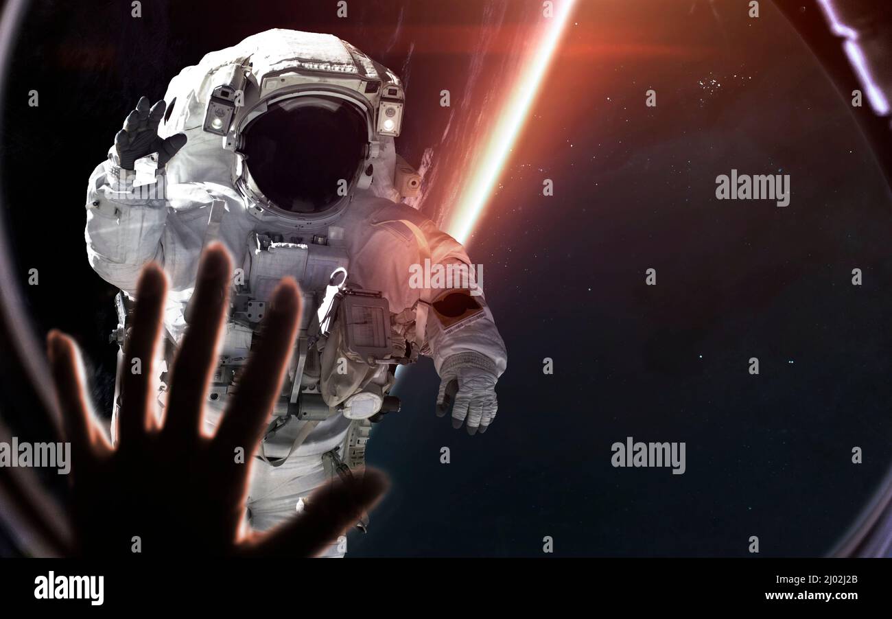 Astronaut at spacewalk. Science fiction art. Elements of this image ...