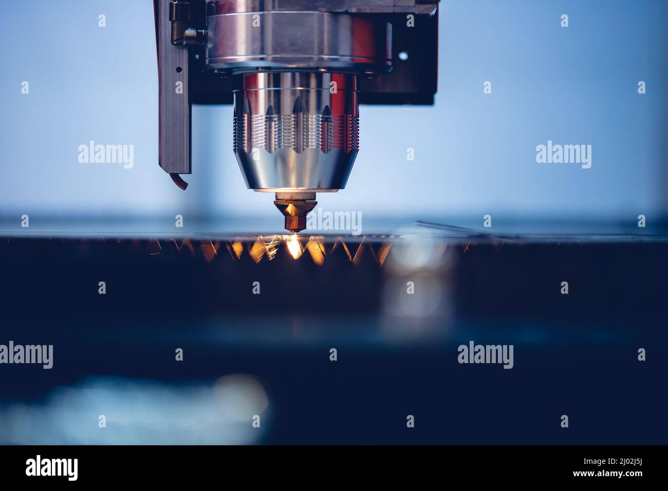Macro photo cutting of metal CNC Laser engraving. Concept background ...