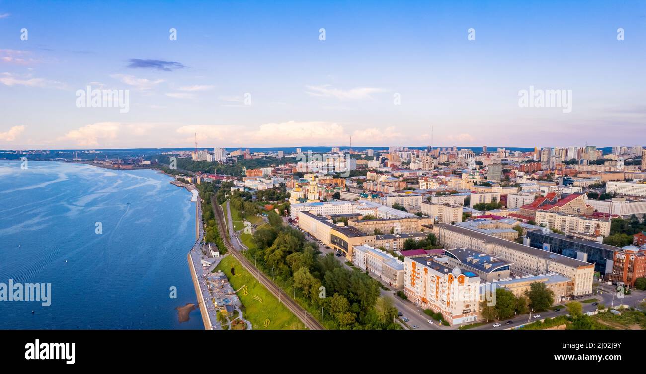 Aerial top view panorama city Perm and central embankment of Kama river ...