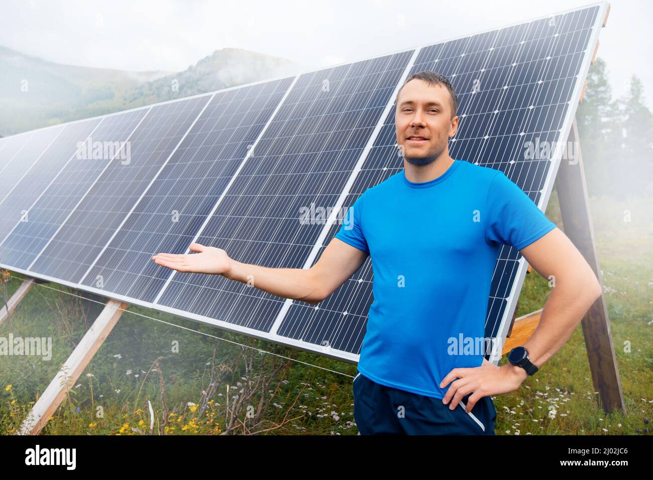 Young male engineer background solar panels with sun light Stock Photo ...
