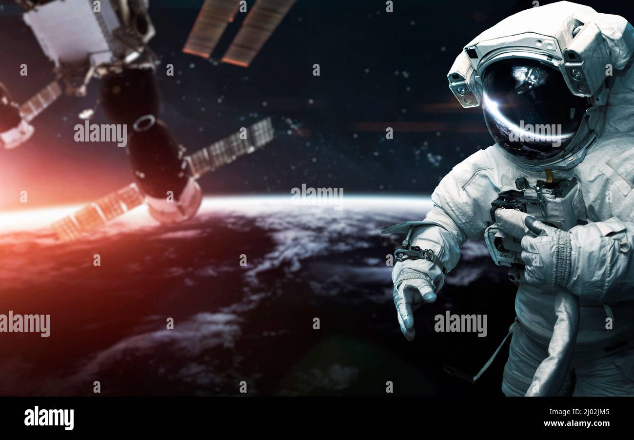 Look on our planet from orbit and astronauts at the spacewalk. Elements ...