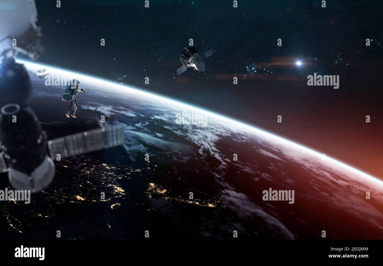 Look on our planet from orbit and astronauts at the spacewalk. Elements ...
