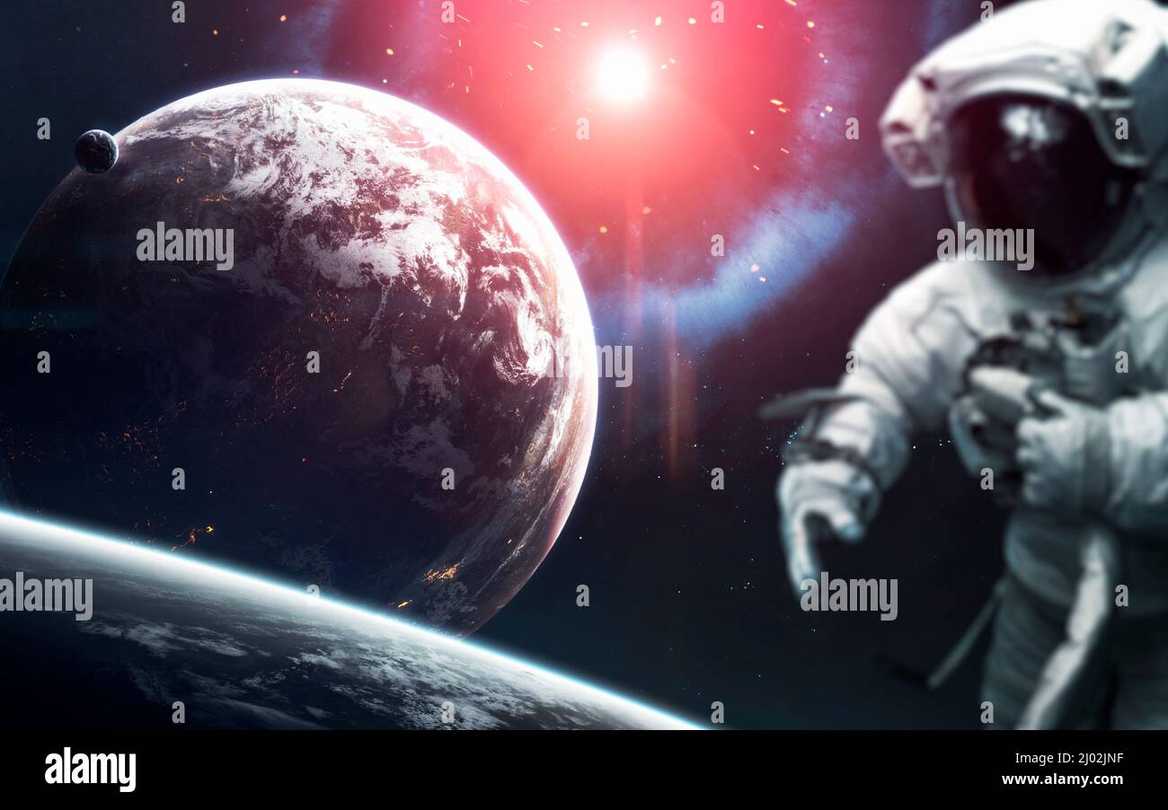 Awesome beautiful planets somewhere in deep space with the astronaut in ...
