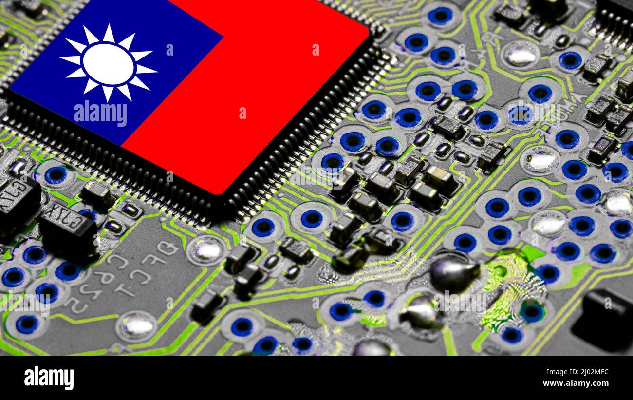 Taiwanese National Flag overlaid on PC micro chip on integrated circuit ...