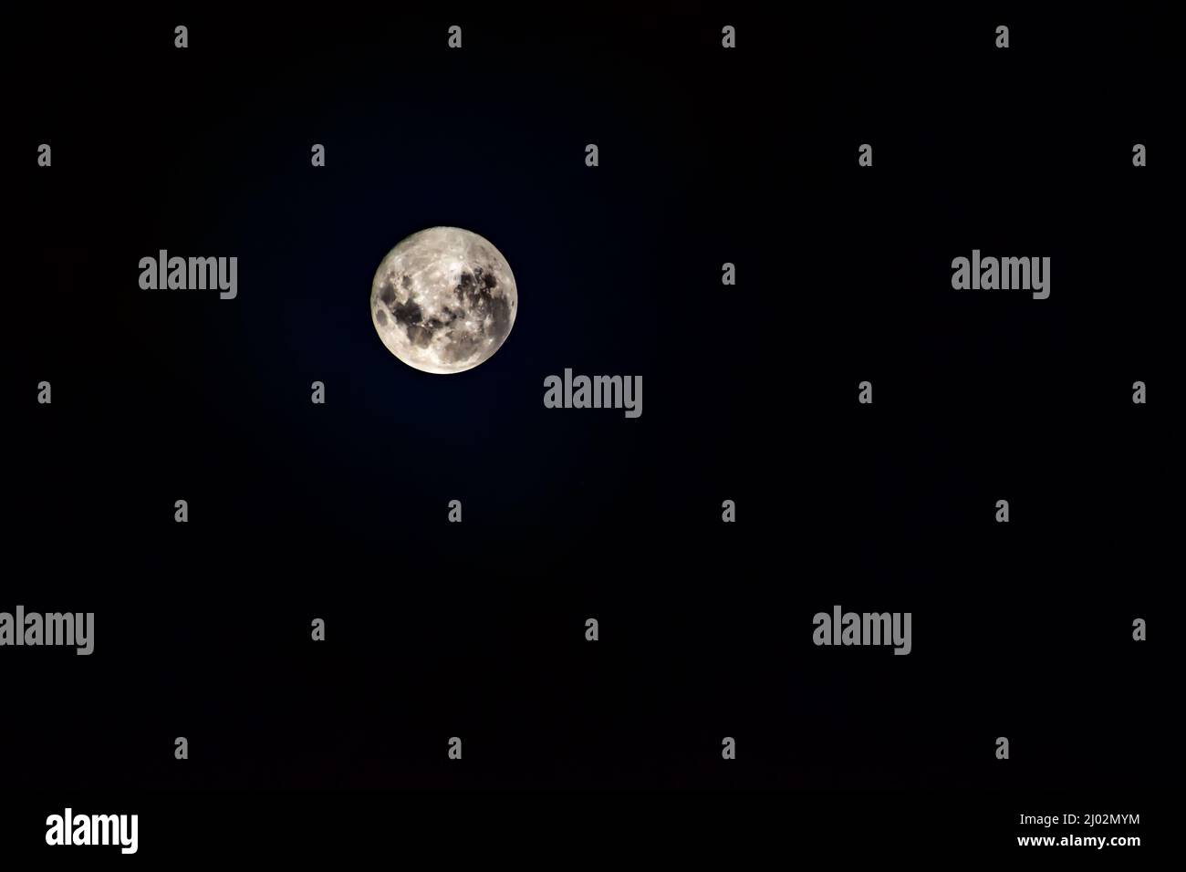 The moon at midnight Stock Photo - Alamy