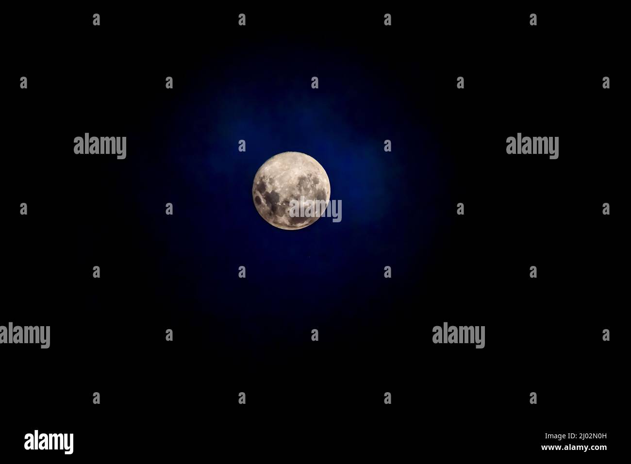 The moon at midnight Stock Photo - Alamy