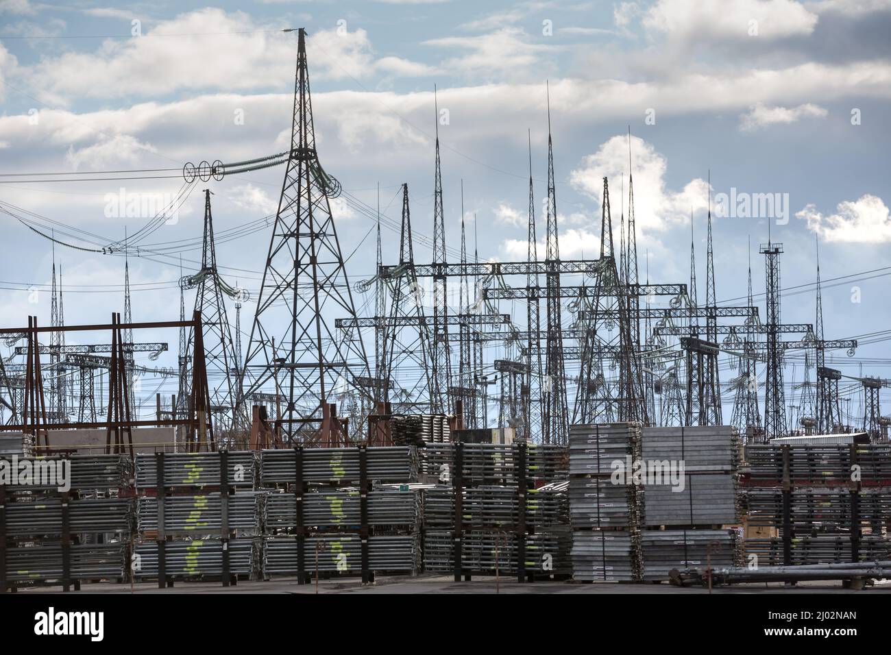 Transformer substations and high-voltage power lines are seen at ...
