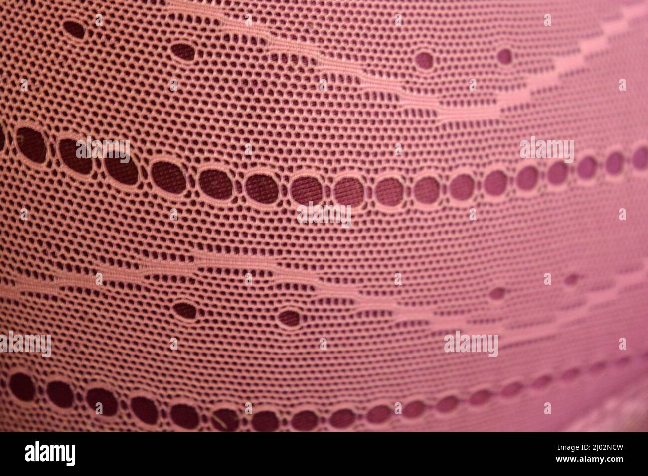 Unusual materials, backgrounds, synthetic fabrics. Purple thin fabric ...