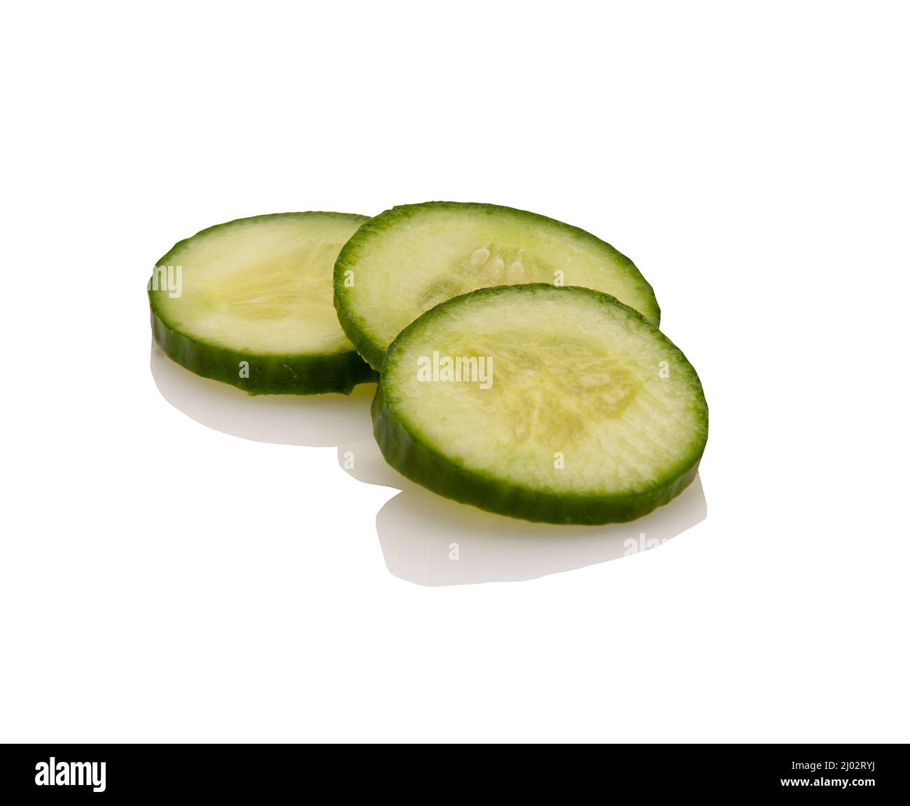 fresh cucumber slices isolated on a white background Stock Photo - Alamy