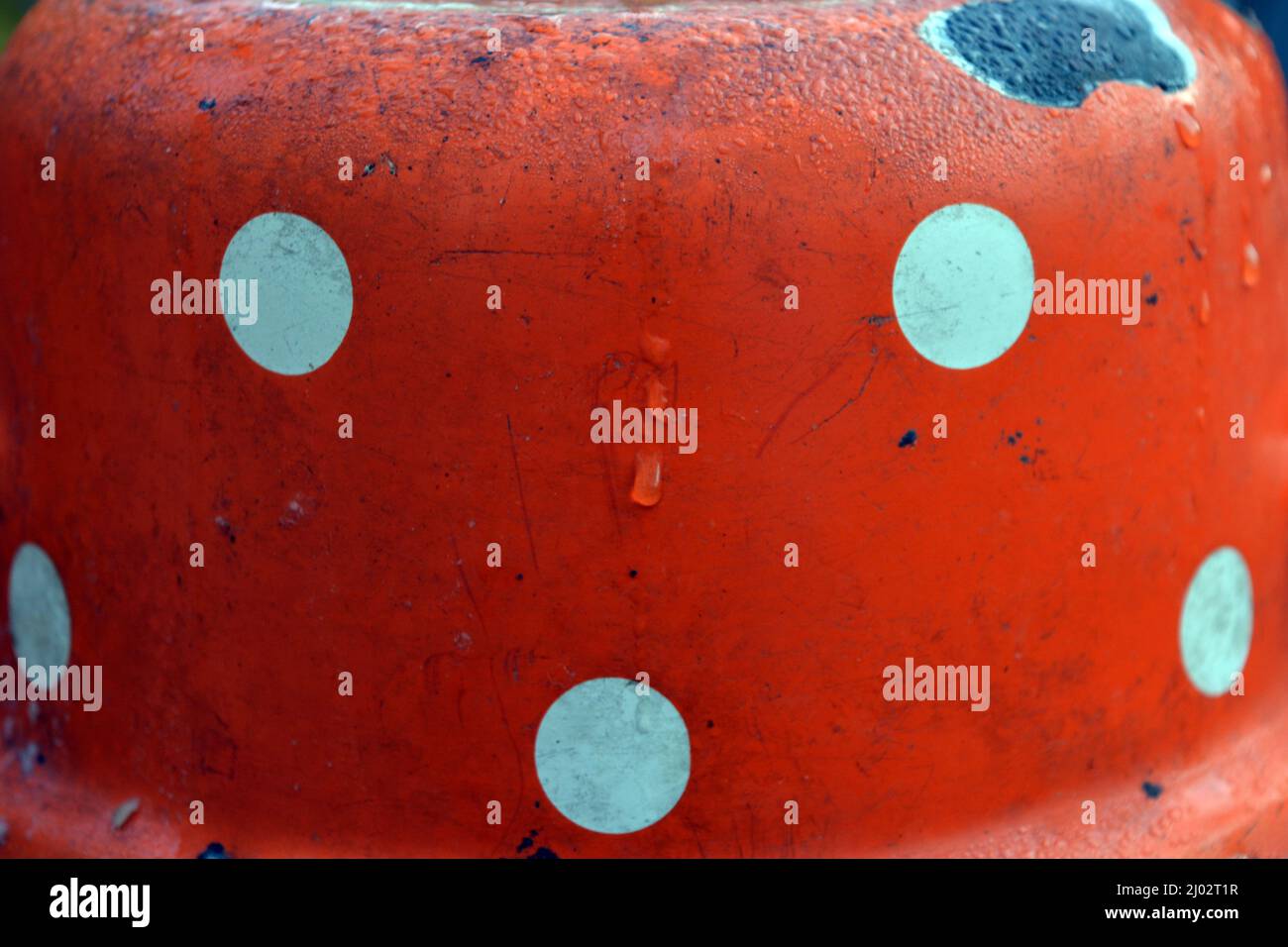 Beautiful and unusual backgrounds made of metal, red with white circles ...