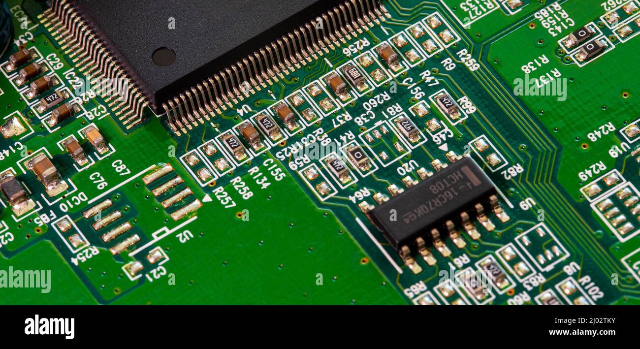 Macro Close up of components and microchips on PC circuit board of ...