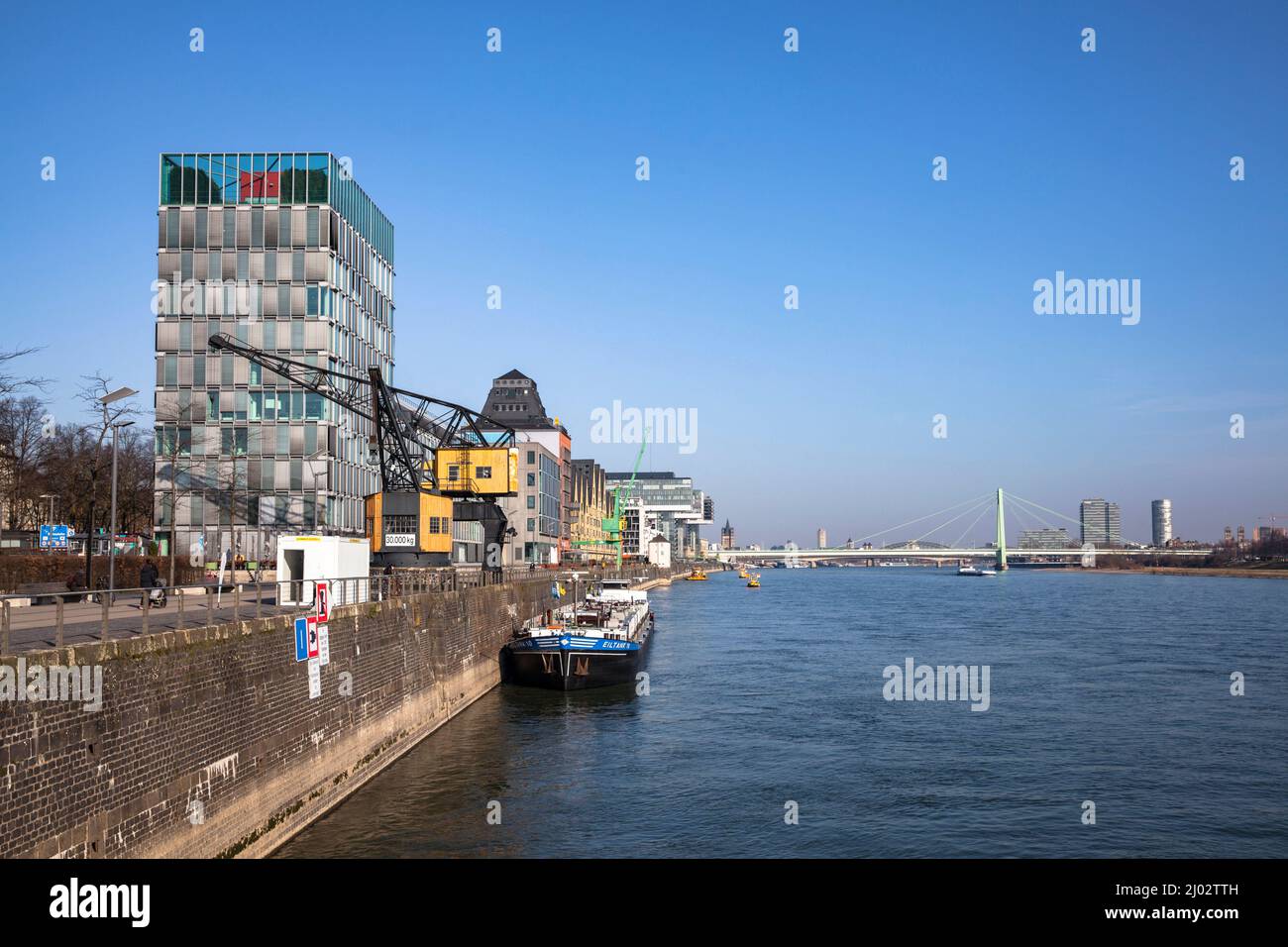 the river Rhine promenade in the Rheinau harbor, office building KAP am ...