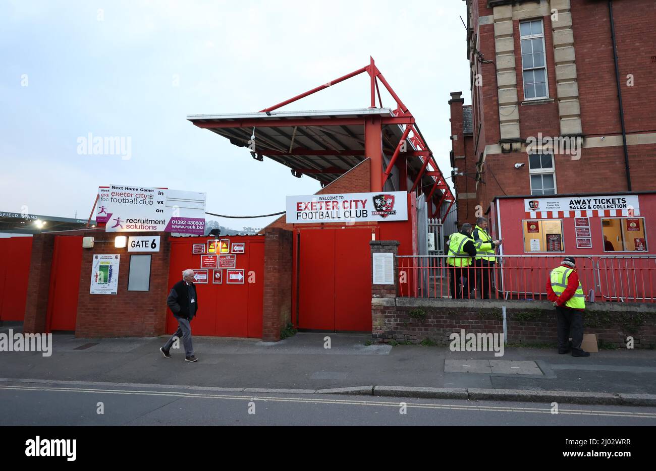 Programme seller outside St James Park home of Exeter City before their ...