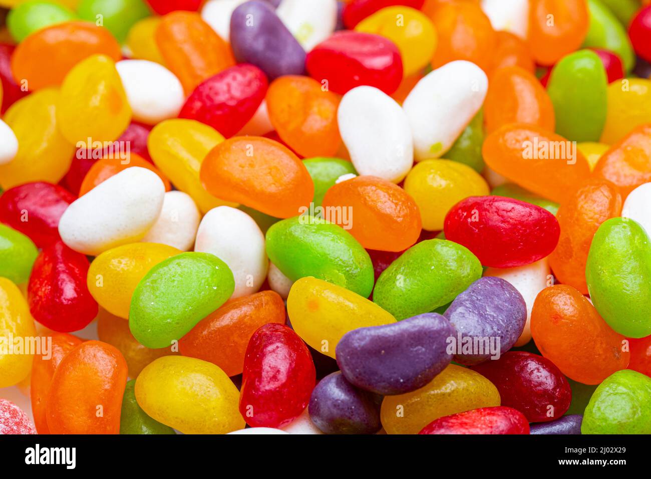 Assorted gummy candies and jellies as background. A lot of colorful ...