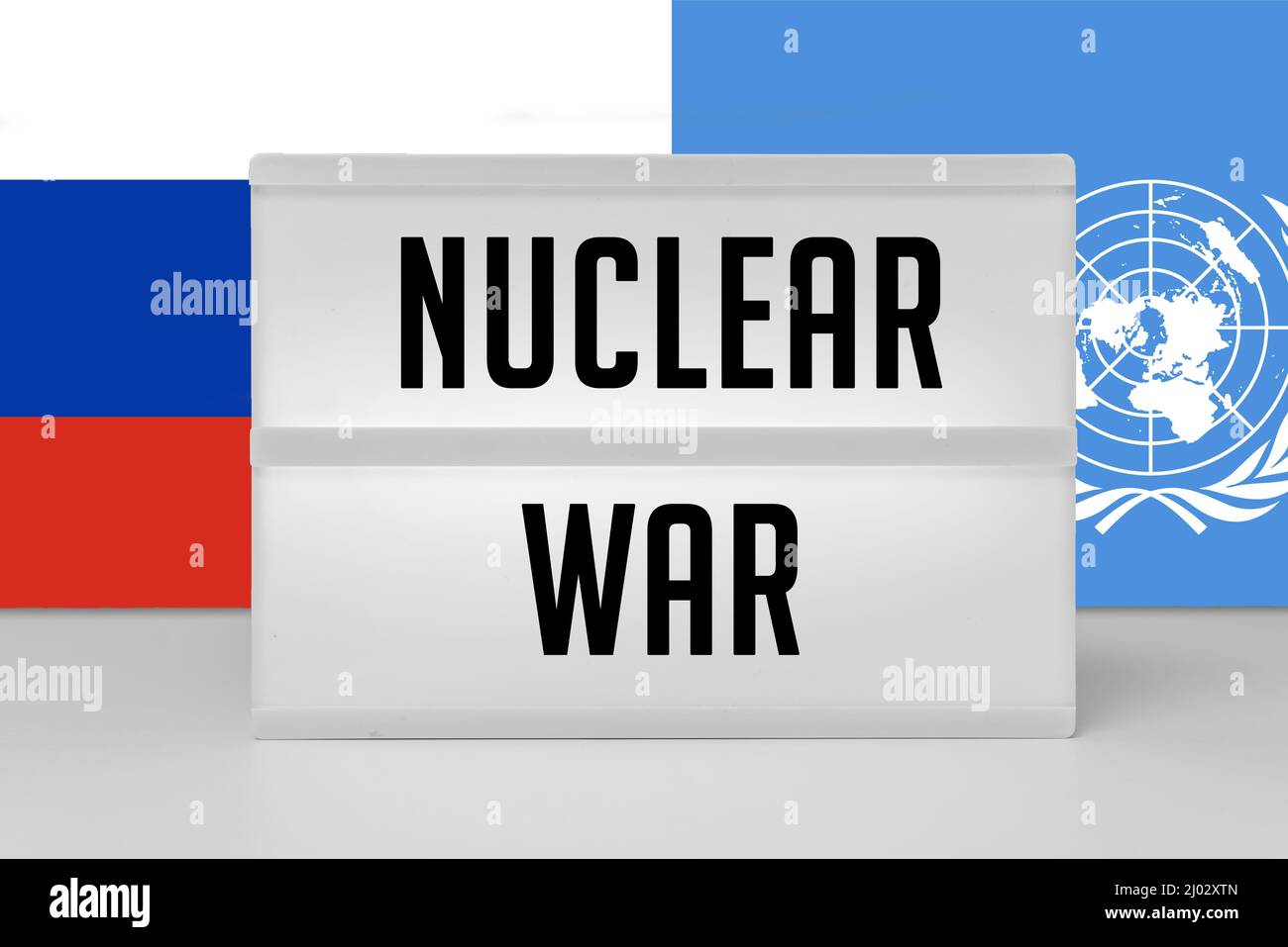 A 3d illustration of a bord with 'NUCLEAR WAR' writing on a russian and ...