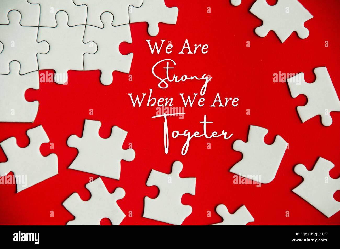 Text on missing jigsaw puzzle - We are strong when we are together ...