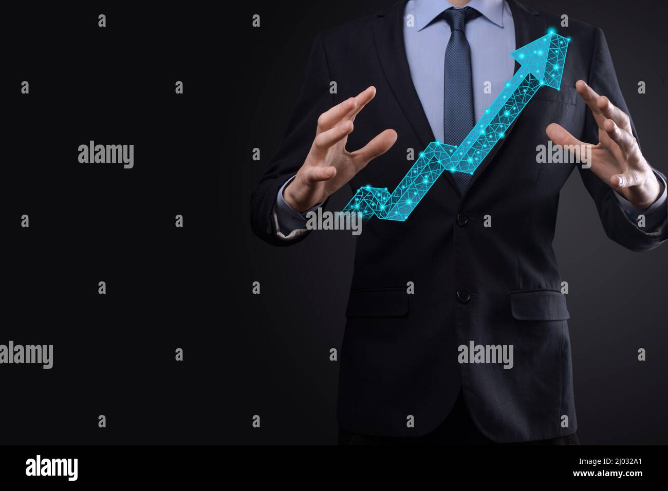 Businessman hold graph, arrow of positive growth icon.pointing at ...