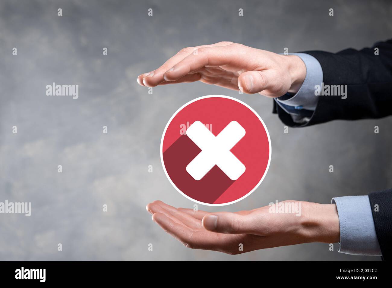 Hand holds icon,cancellation symbol,cancel icon.Cross mark flat red ...