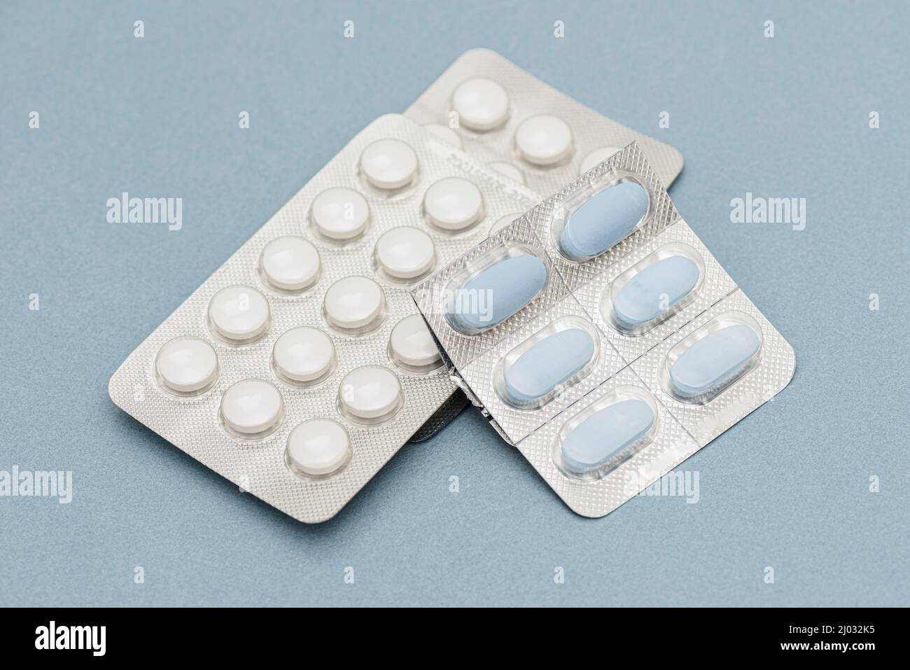 Colorful of tablets and capsules pill in blister packaging arranged on ...