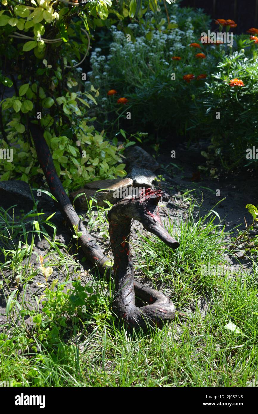 Landscaping, greenery, beautiful trees and bushes with an object ...